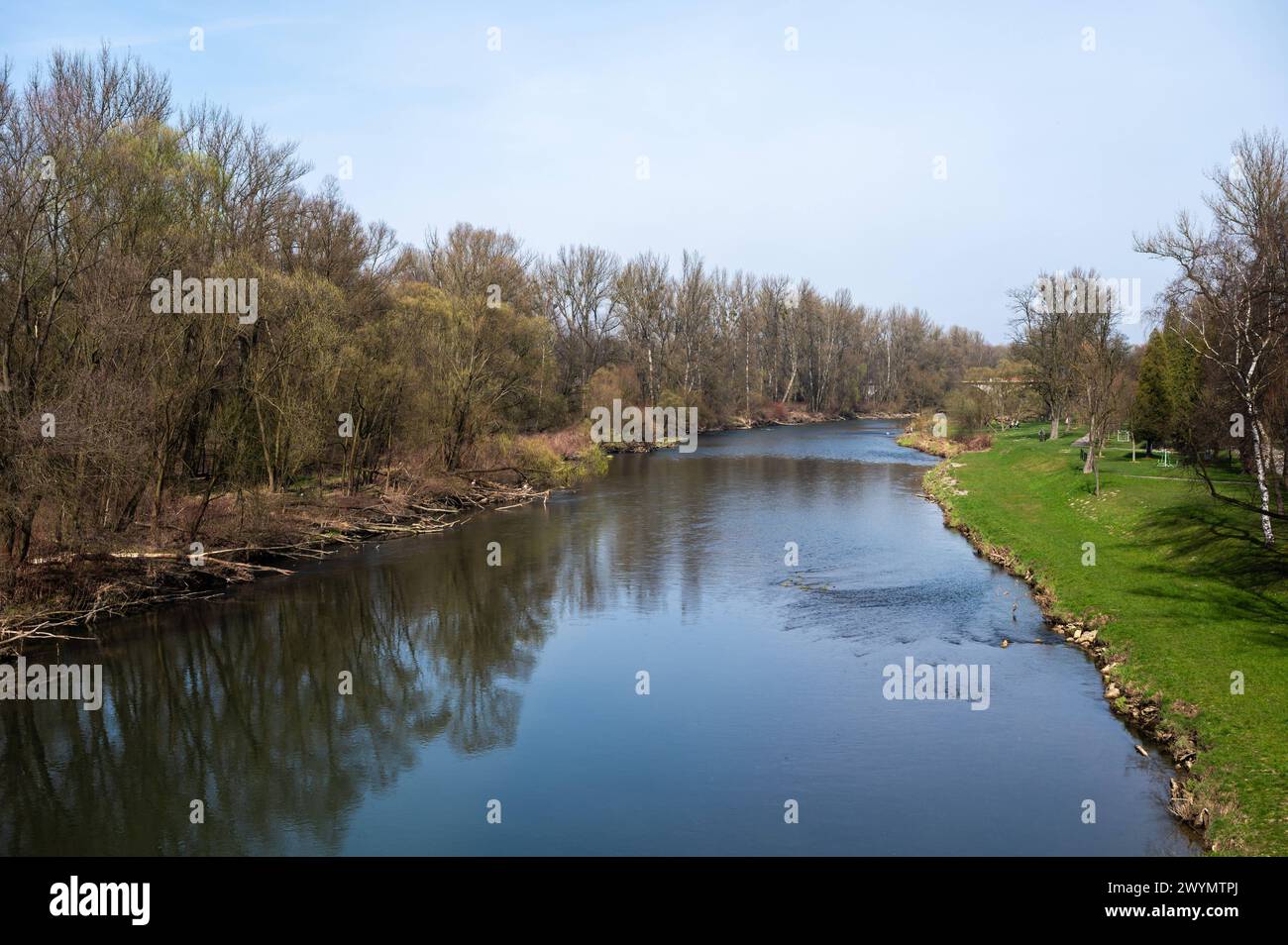 The Sola river and green banks in a city park, Auschwitz, Poland Stock ...