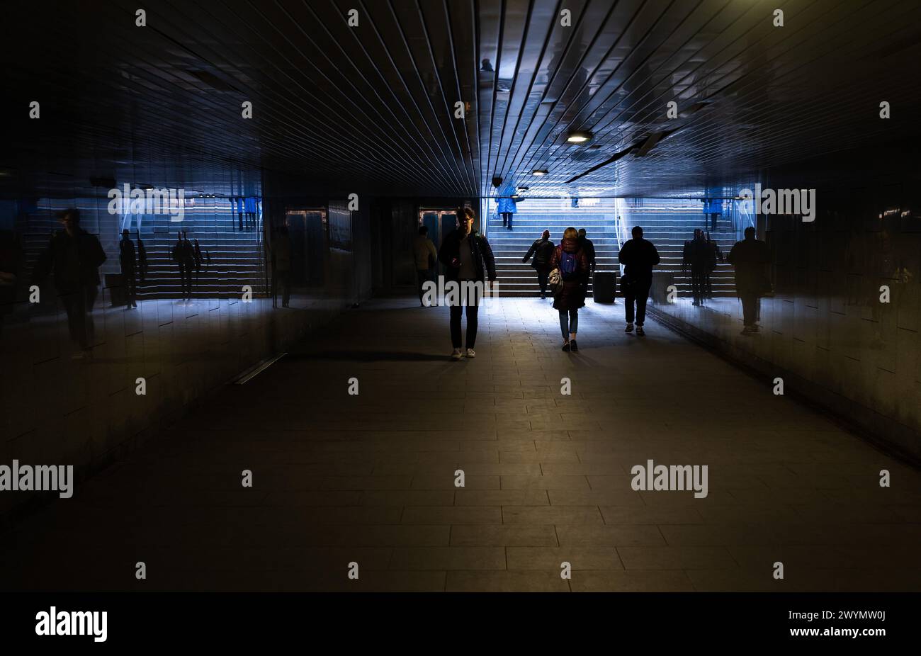 Krakow, Lesser Poland, March 19, 2024 People walking through the ...