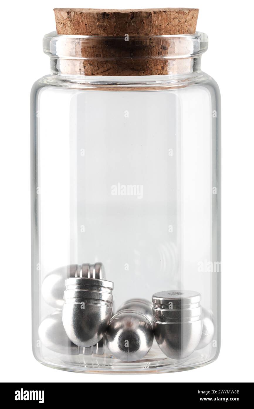 silver bullets for muzzle guns in apothecary glass jar on white ...