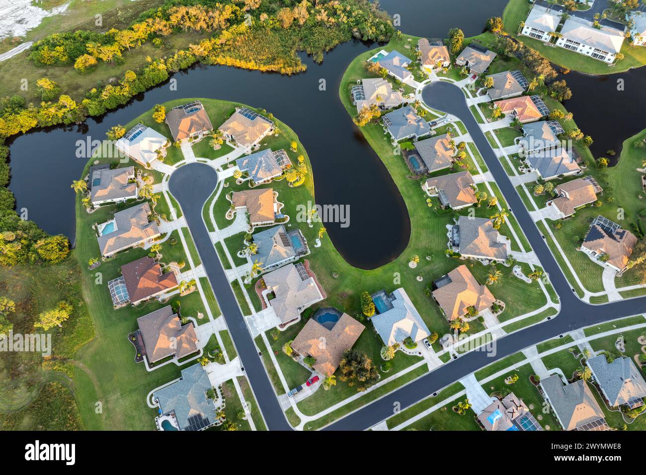 Aerial view of spacious family houses in Florida suburban area. Real ...