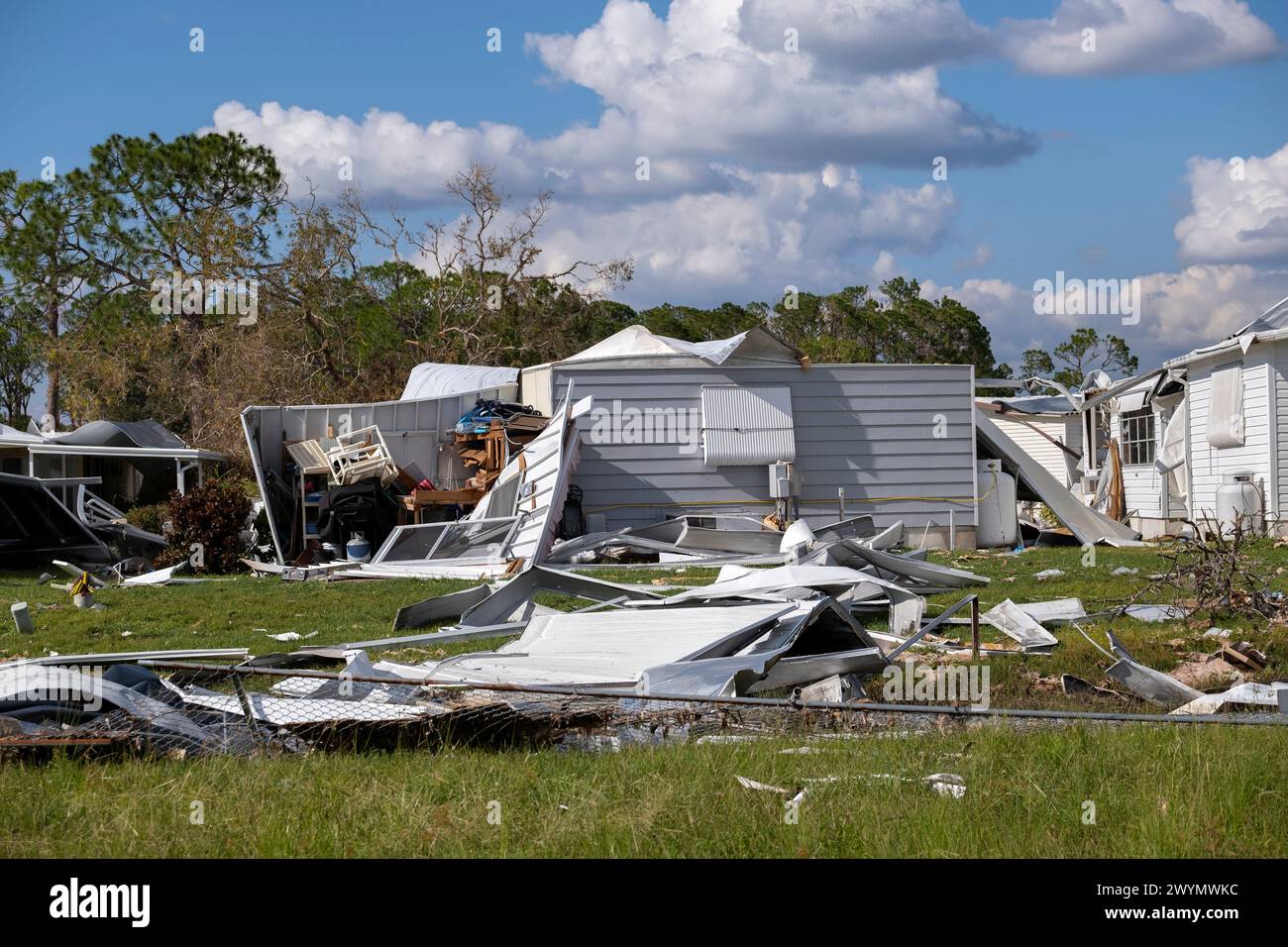 Aftermath of natural disaster in southern Florida. Badly damaged mobile ...