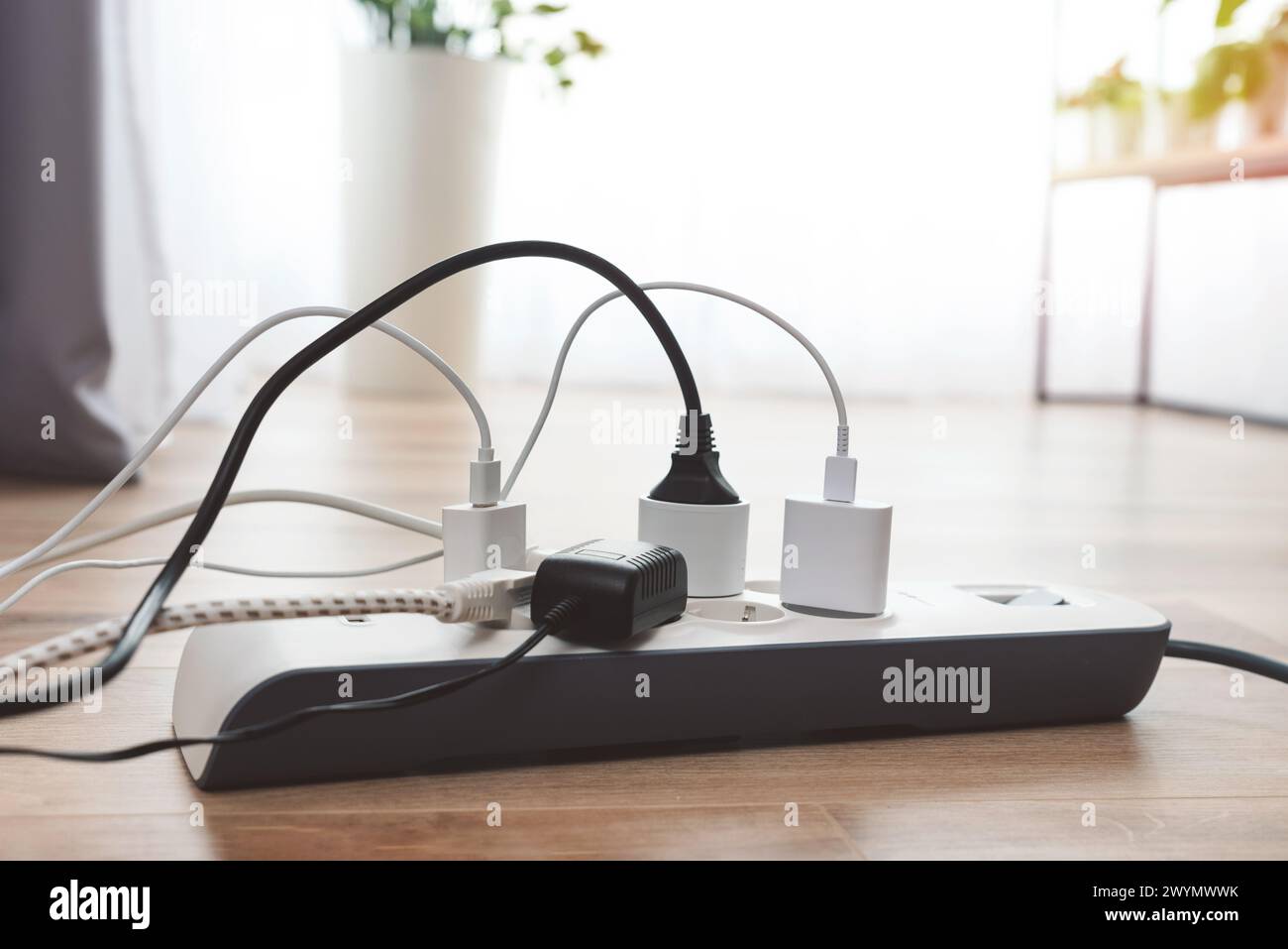 Electric power strip. Power plugs and a one multi socket electrical ...