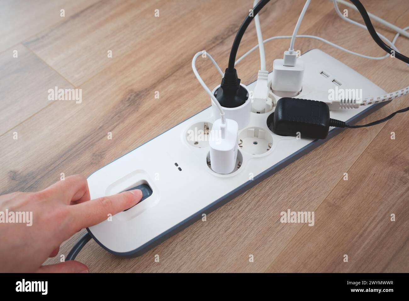 Man plugging in power hi-res stock photography and images - Alamy