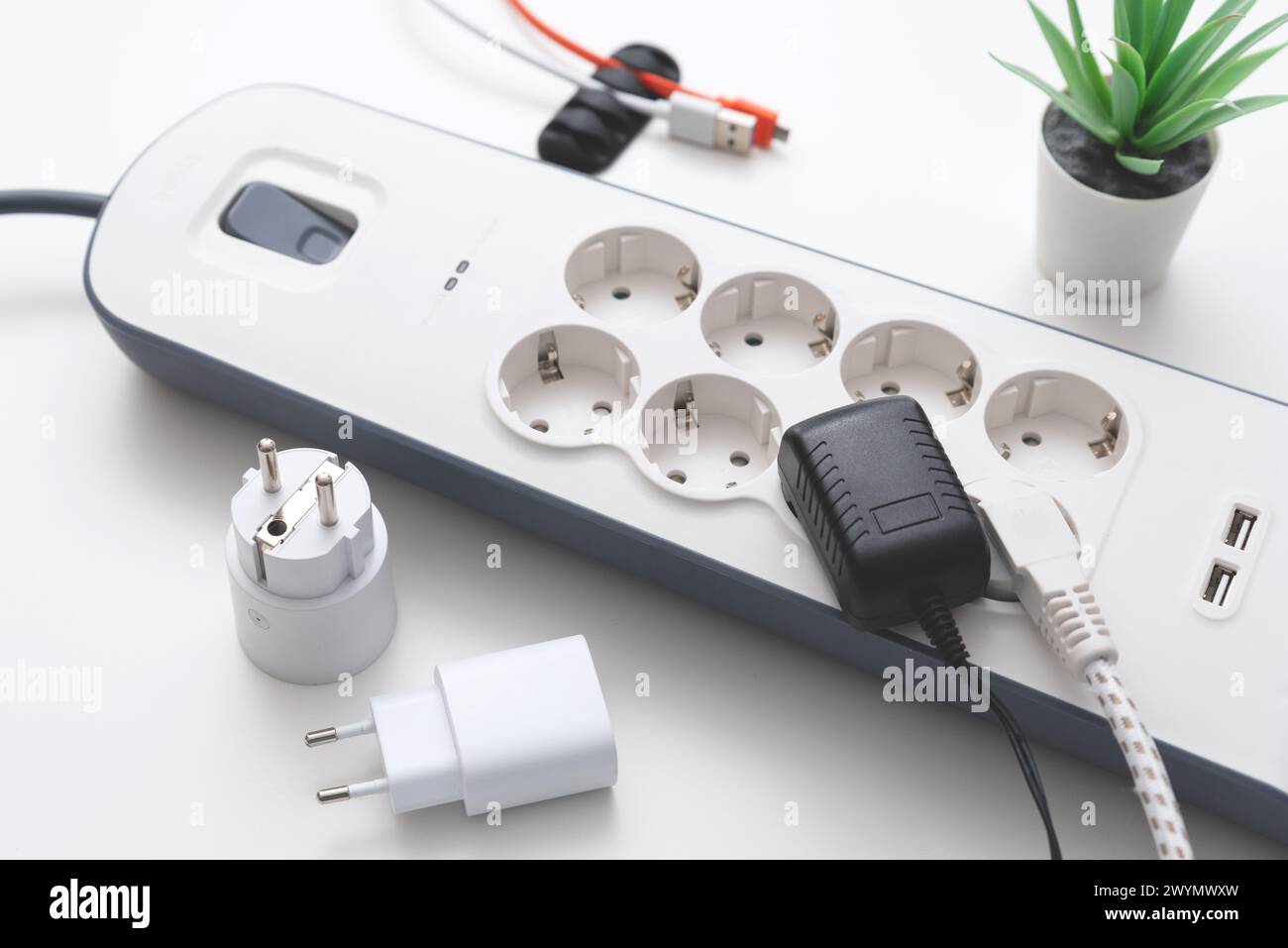 Electric power strip. Power plugs and a one multi socket electrical ...