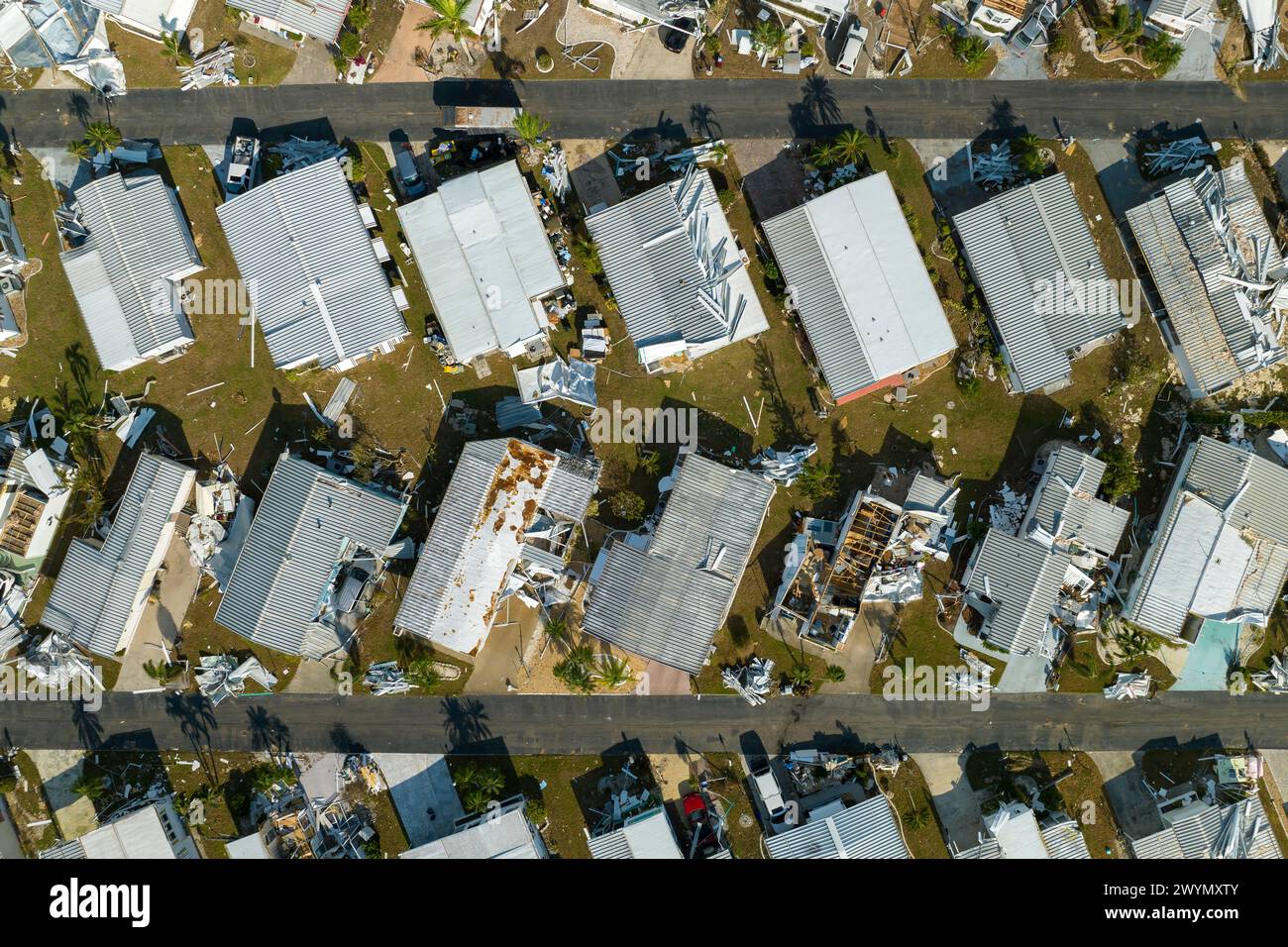 Destroyed by hurricane strong winds suburban houses in Florida mobile ...