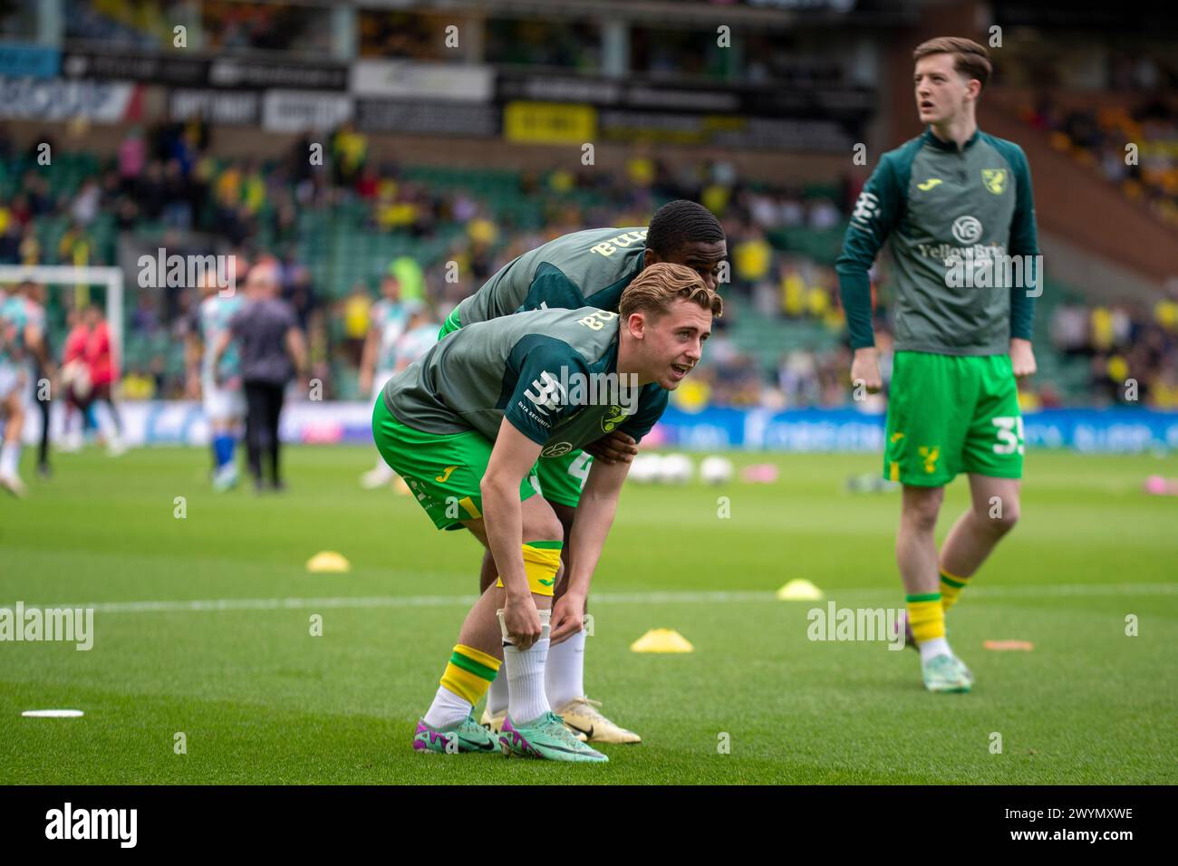 Ken Aboh of Norwich City is seen interacting with Finley Welch of ...