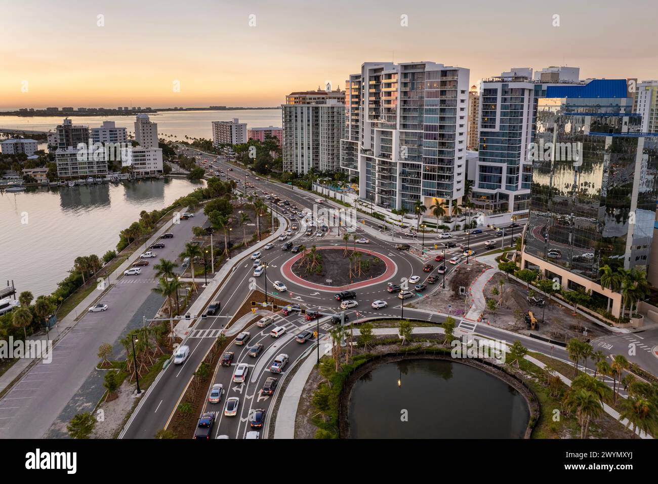 Driving traffic cars at Gulfstream Avenue roundabout intersection ...