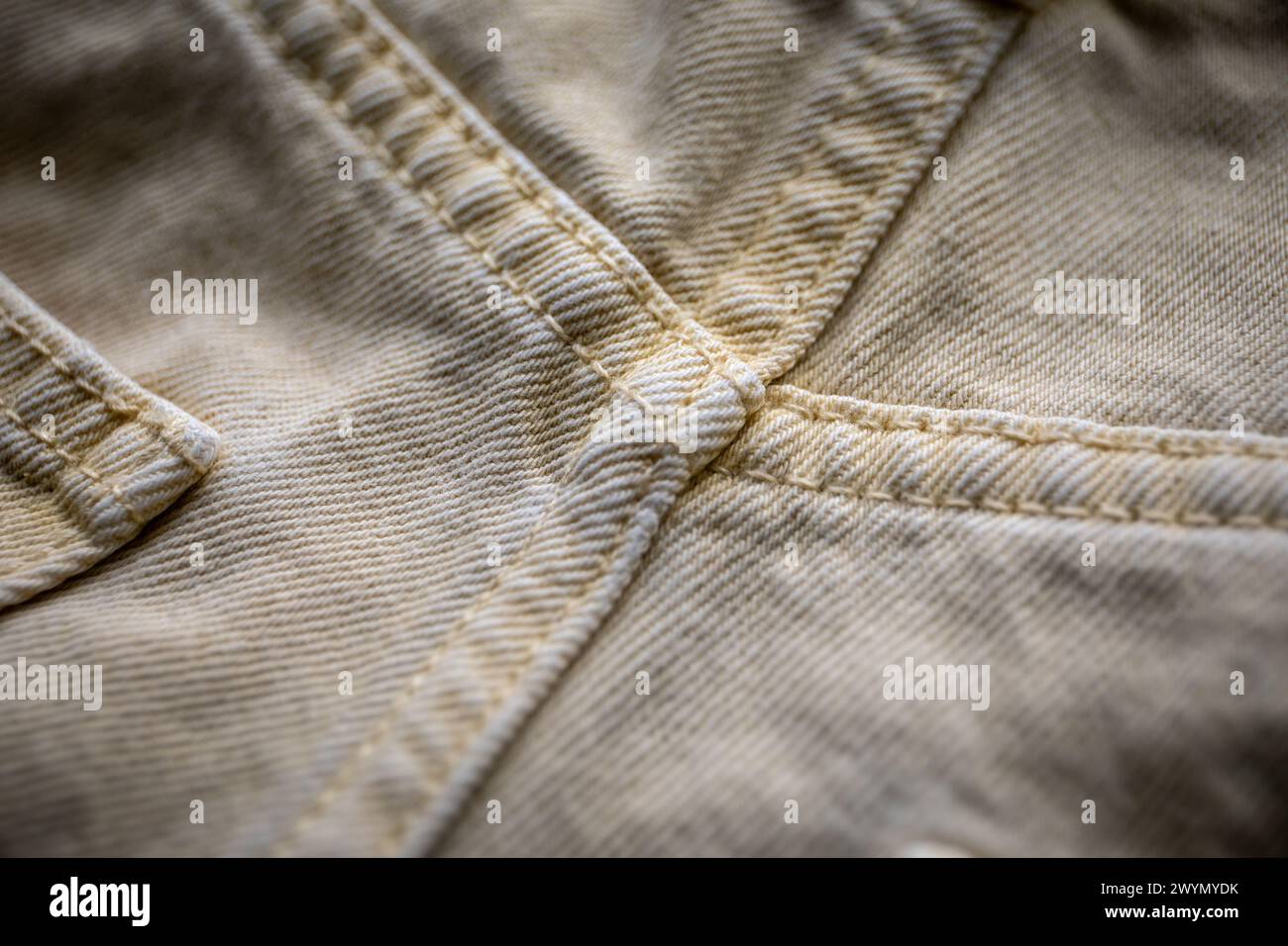 Yellow denim fabric close-up, distinct texture. Abstract background ...