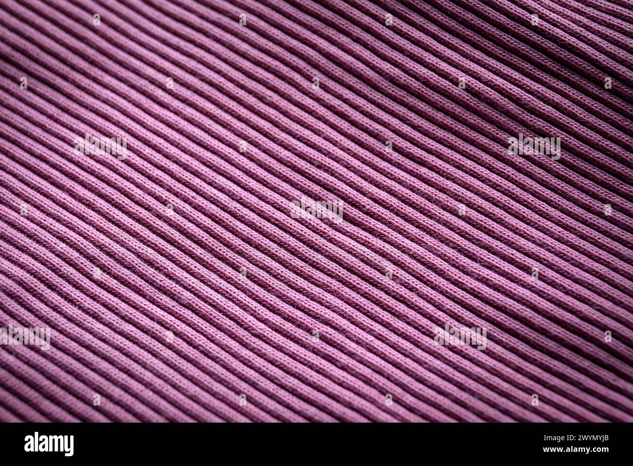 Purple knit with seam, ribbed, distinct texture, curved fabric Stock ...
