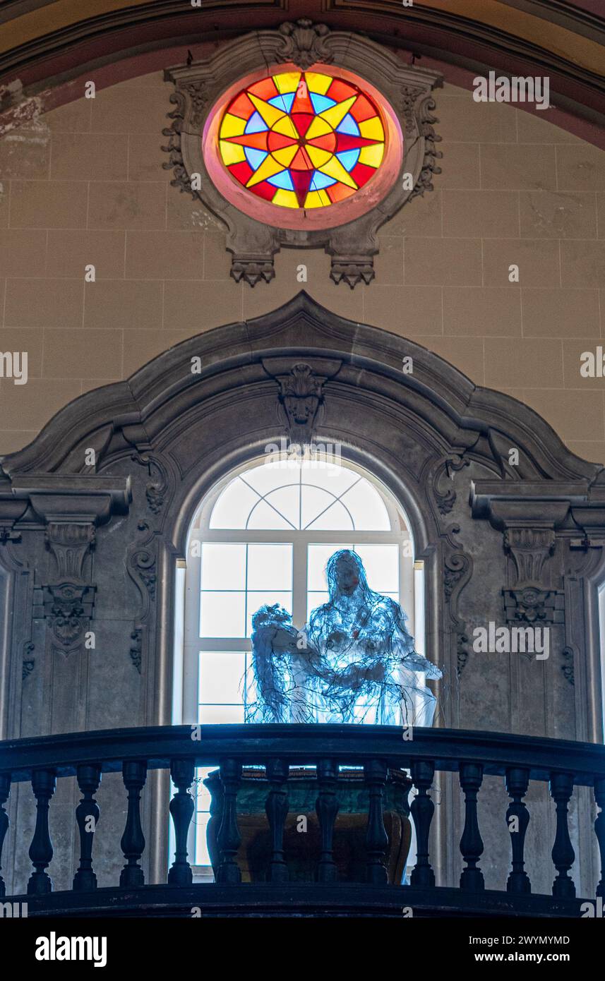 Human representation of a human being with another on his lap inside ...