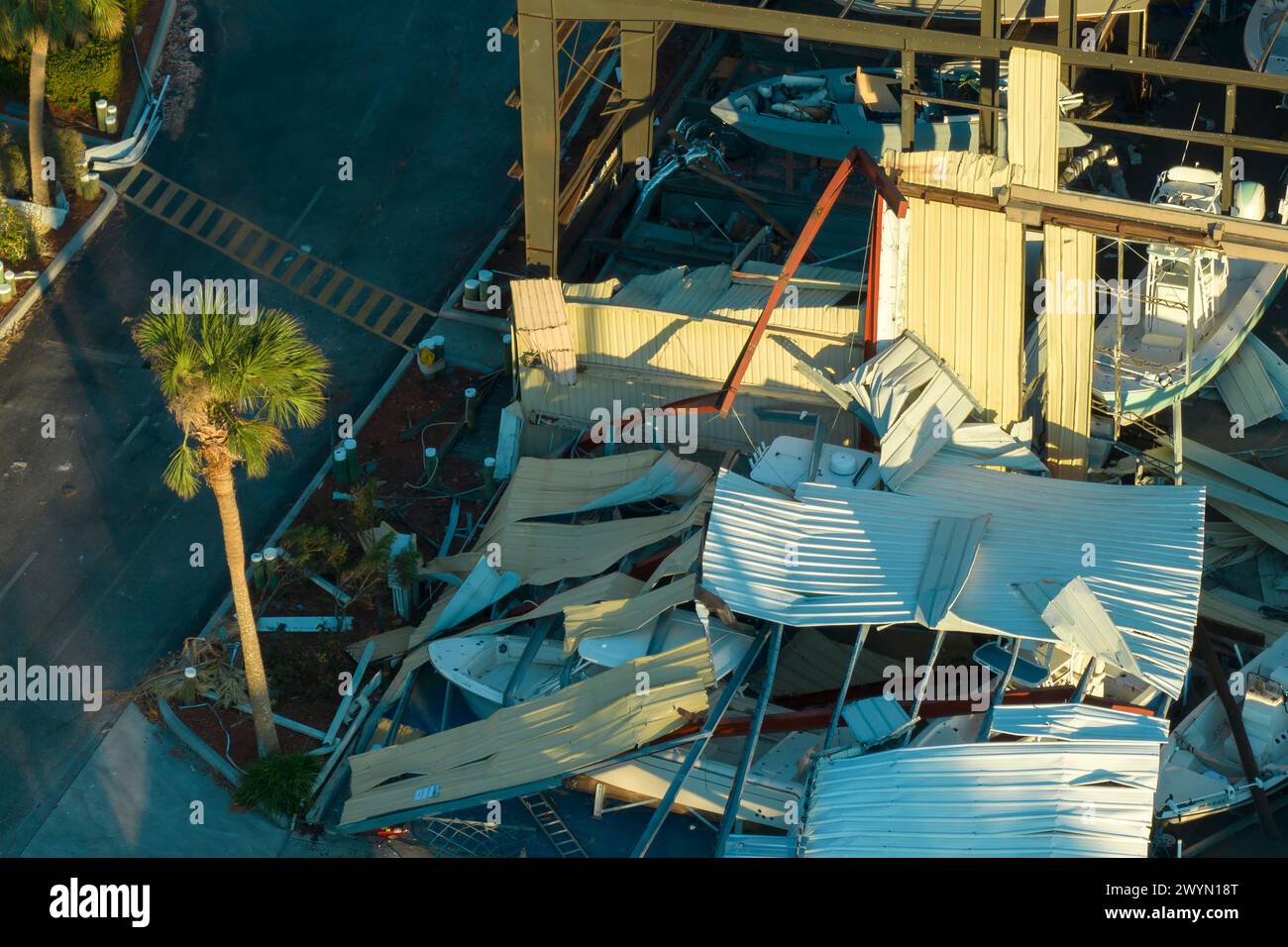 Warehouse with motorboats and yachts destroyed by hurricane winds in ...
