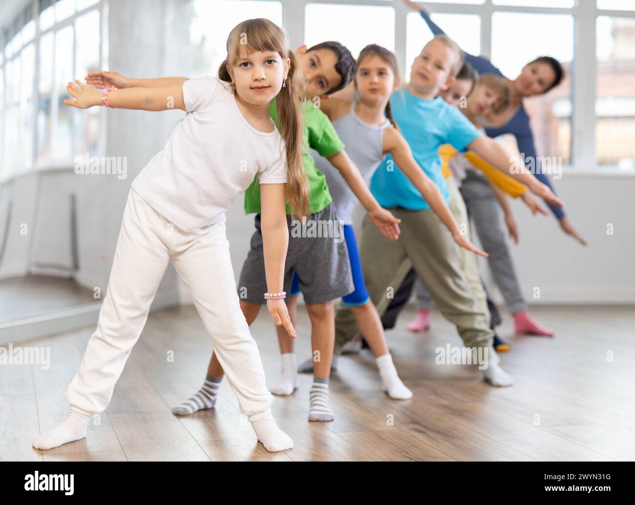 Children warm up exercises hi-res stock photography and images - Alamy