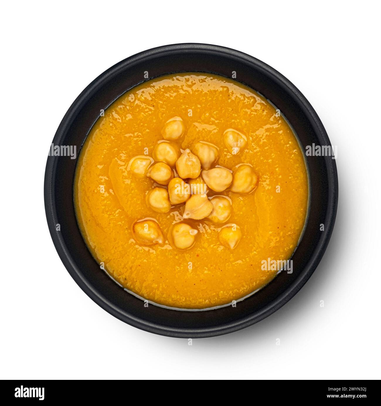 Chickpea cream soup isolated on white background, top view Stock Photo ...
