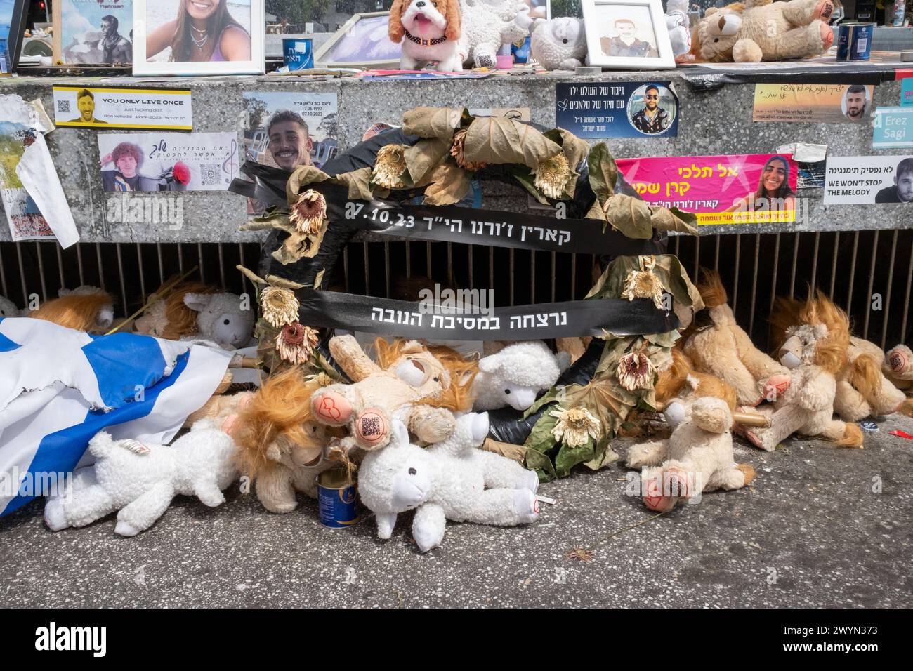 Tel Aviv, Israel. 17th Mar, 2024. Stuffed animals left at the base of ...