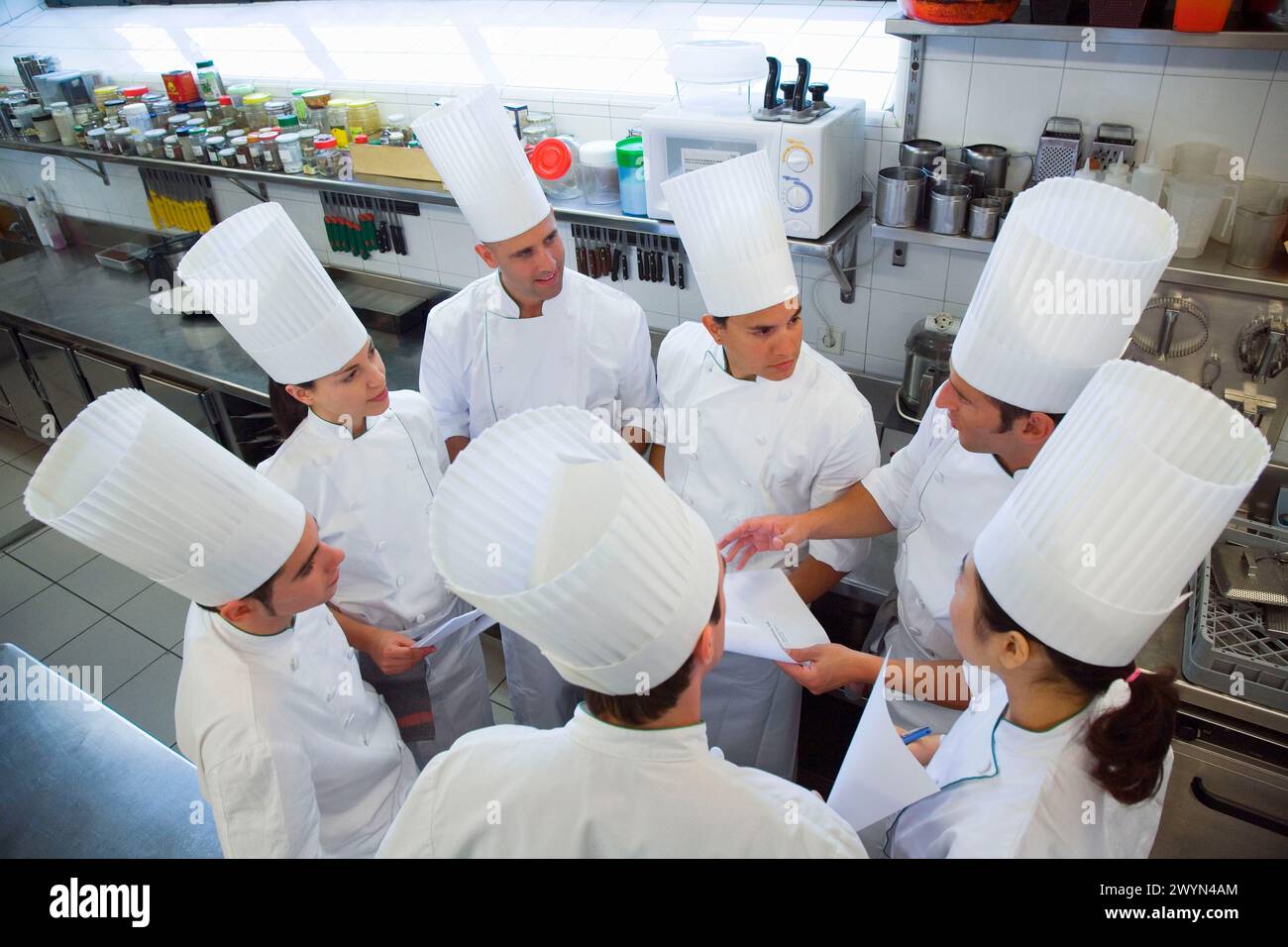 Male female chef explaining hi-res stock photography and images - Alamy
