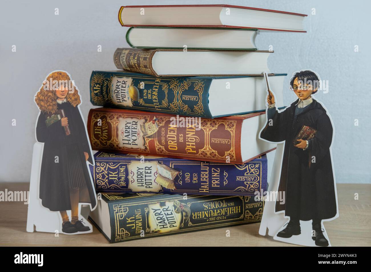 J.K. Rowling's Harry Potter books in various editions, evoking sense ...