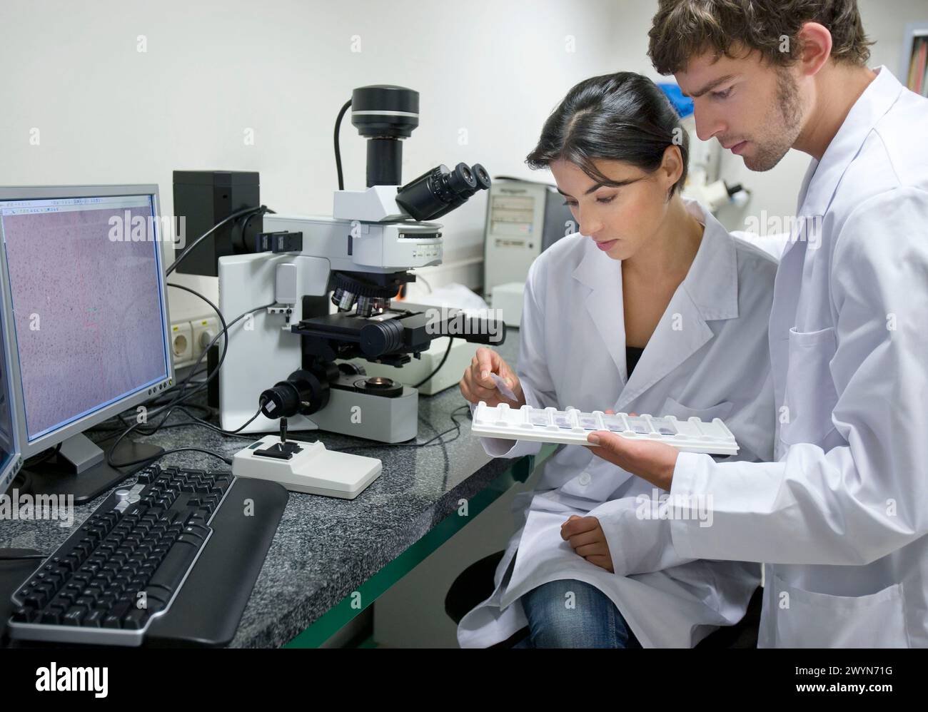 Female researchers working samples hi-res stock photography and images ...