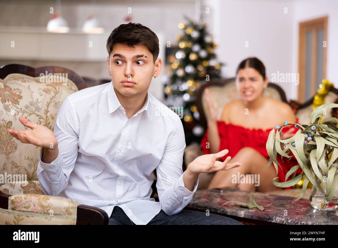 Couple sad christmas interior hi-res stock photography and images - Alamy