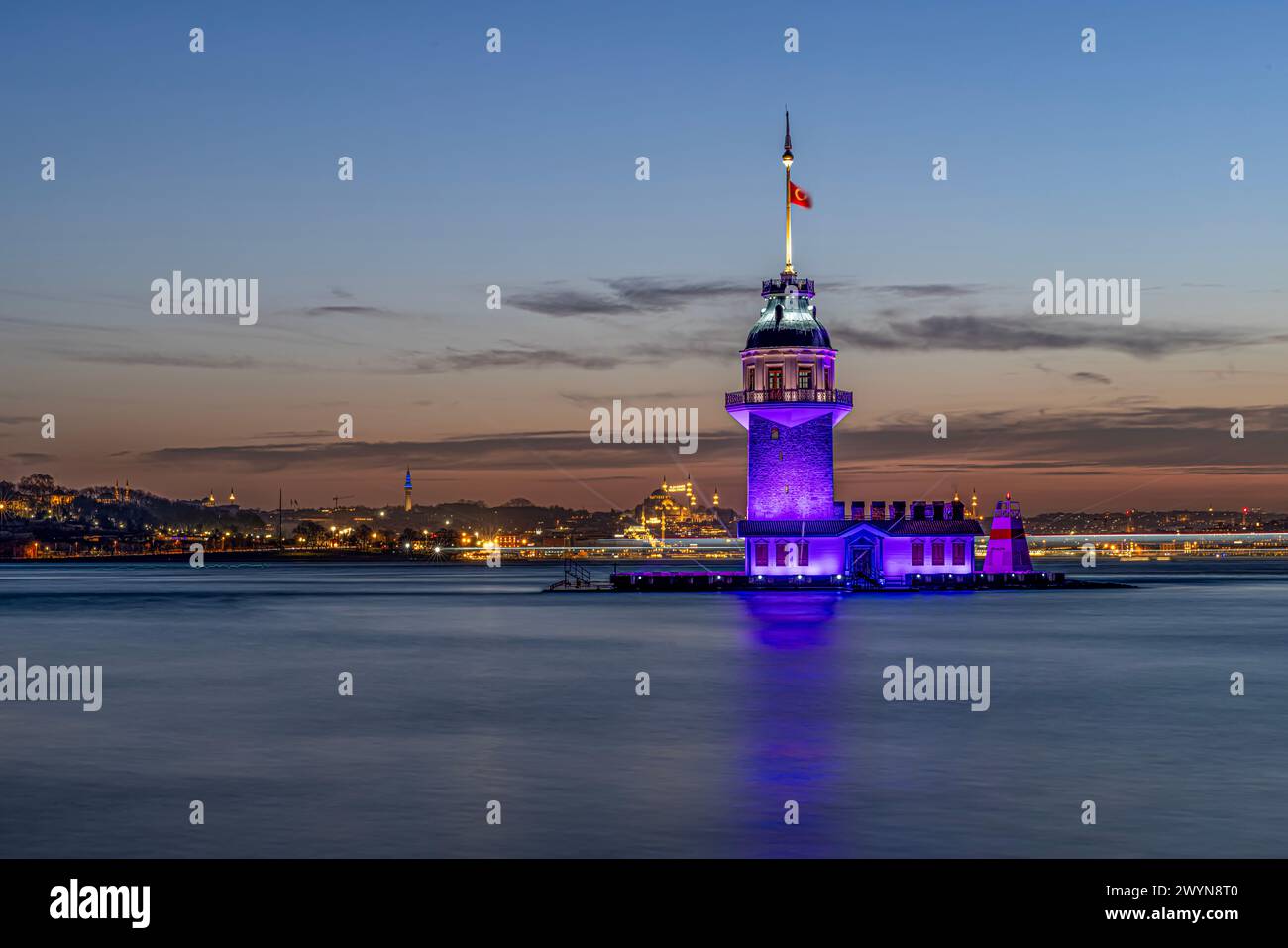 iery sunset over Bosphorus with famous Maiden's Tower (Kiz Kulesi) also ...