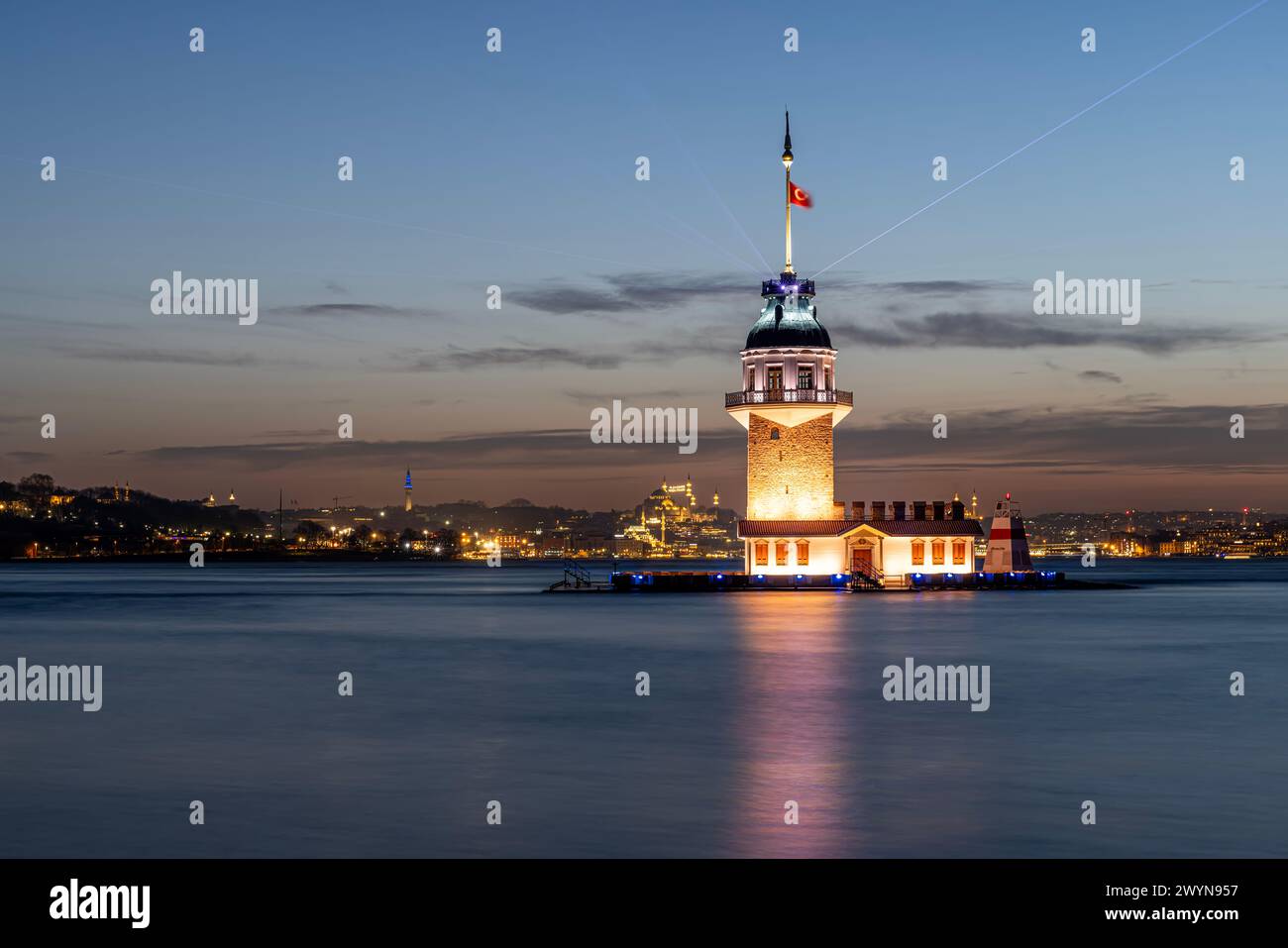 iery sunset over Bosphorus with famous Maiden's Tower (Kiz Kulesi) also ...
