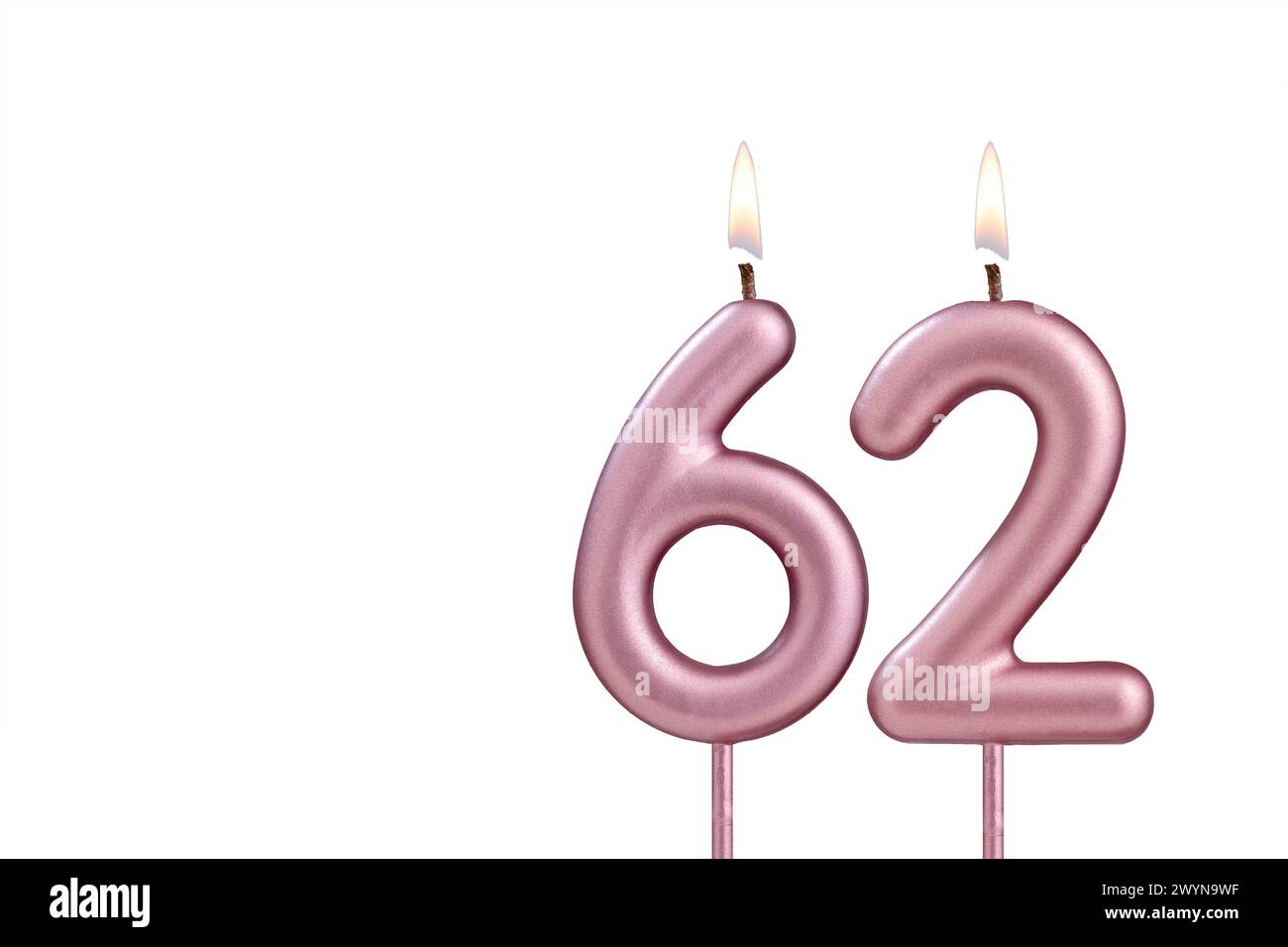 Lit birthday candle - Candle number 62 on white background Stock Photo ...