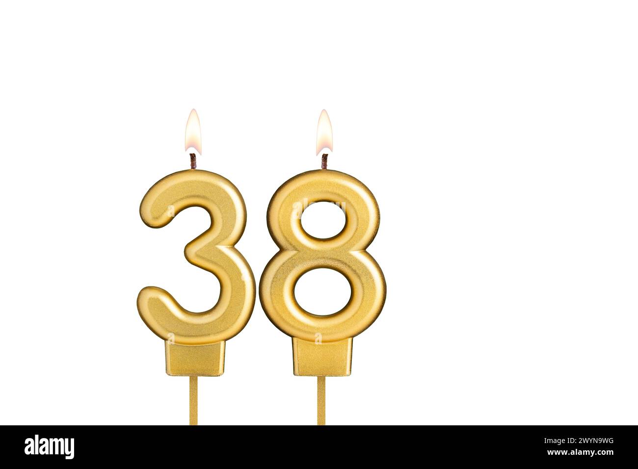 Golden number 38 birthday candle on white background Stock Photo - Alamy