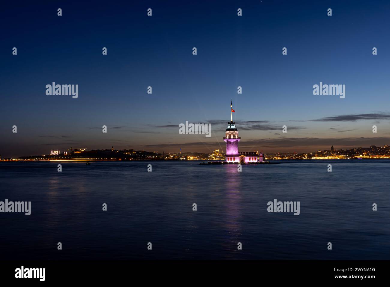 iery sunset over Bosphorus with famous Maiden's Tower (Kiz Kulesi) also ...