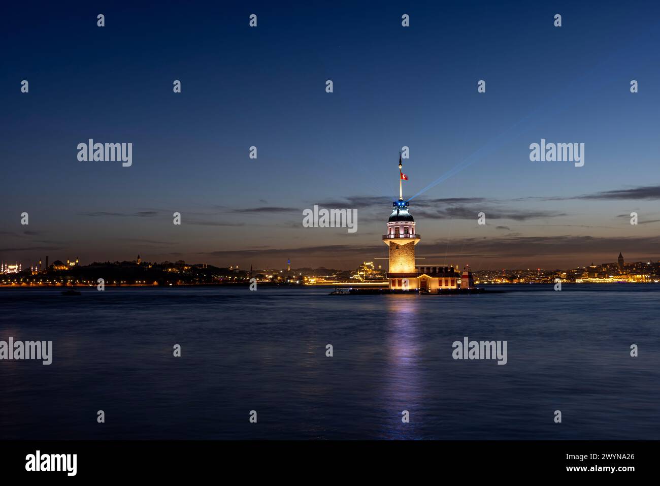 iery sunset over Bosphorus with famous Maiden's Tower (Kiz Kulesi) also ...