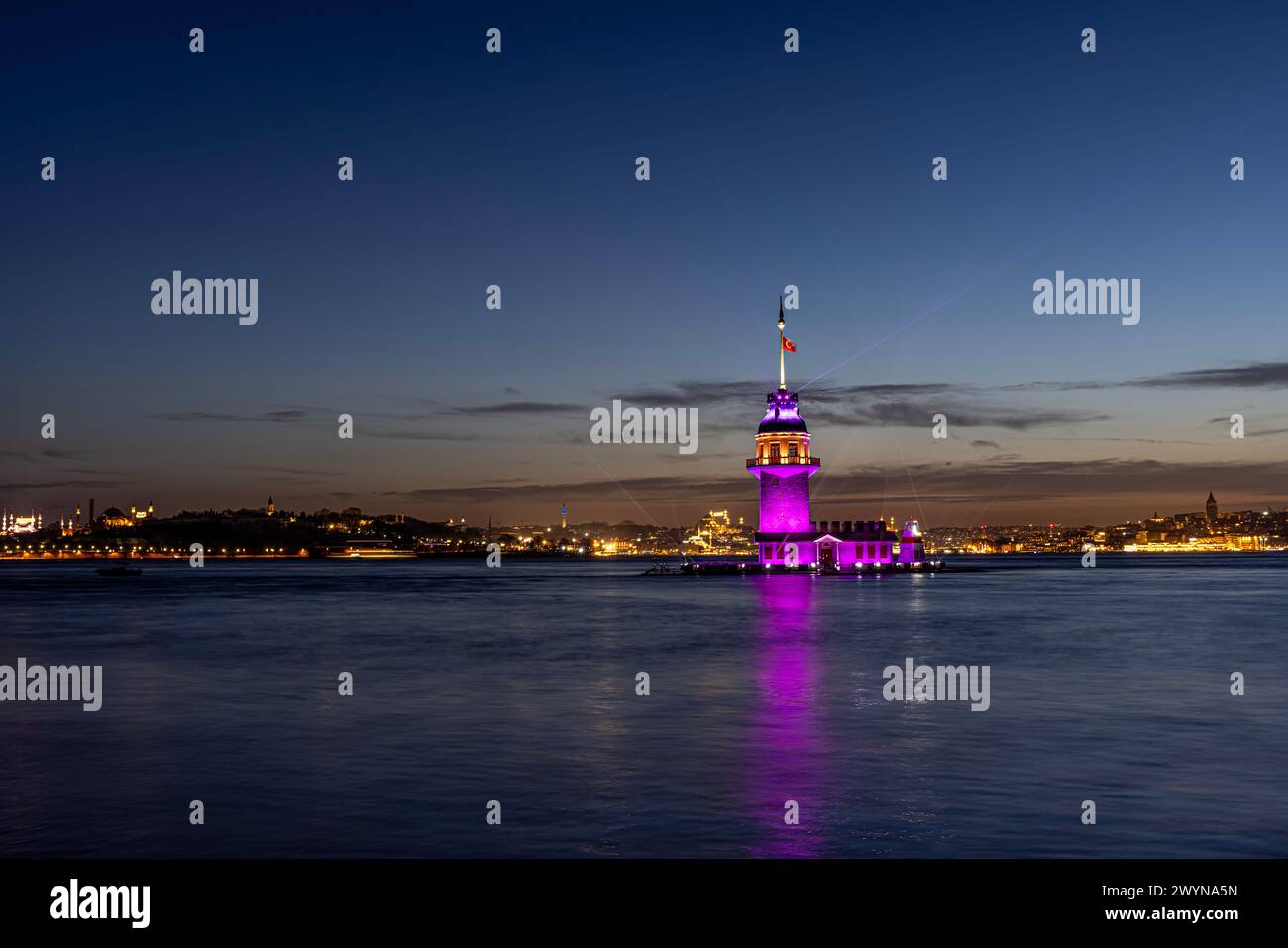 iery sunset over Bosphorus with famous Maiden's Tower (Kiz Kulesi) also ...