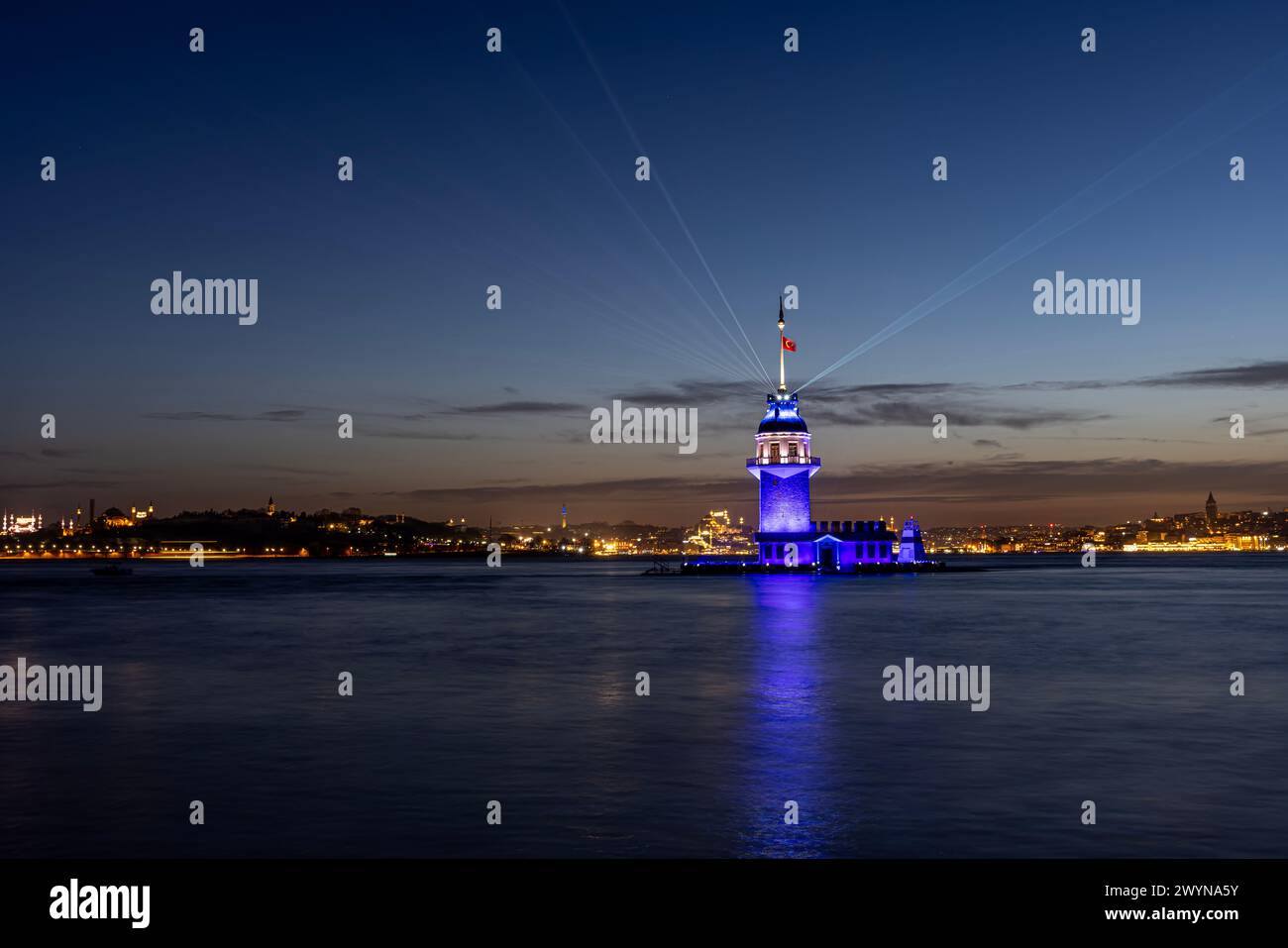 iery sunset over Bosphorus with famous Maiden's Tower (Kiz Kulesi) also ...