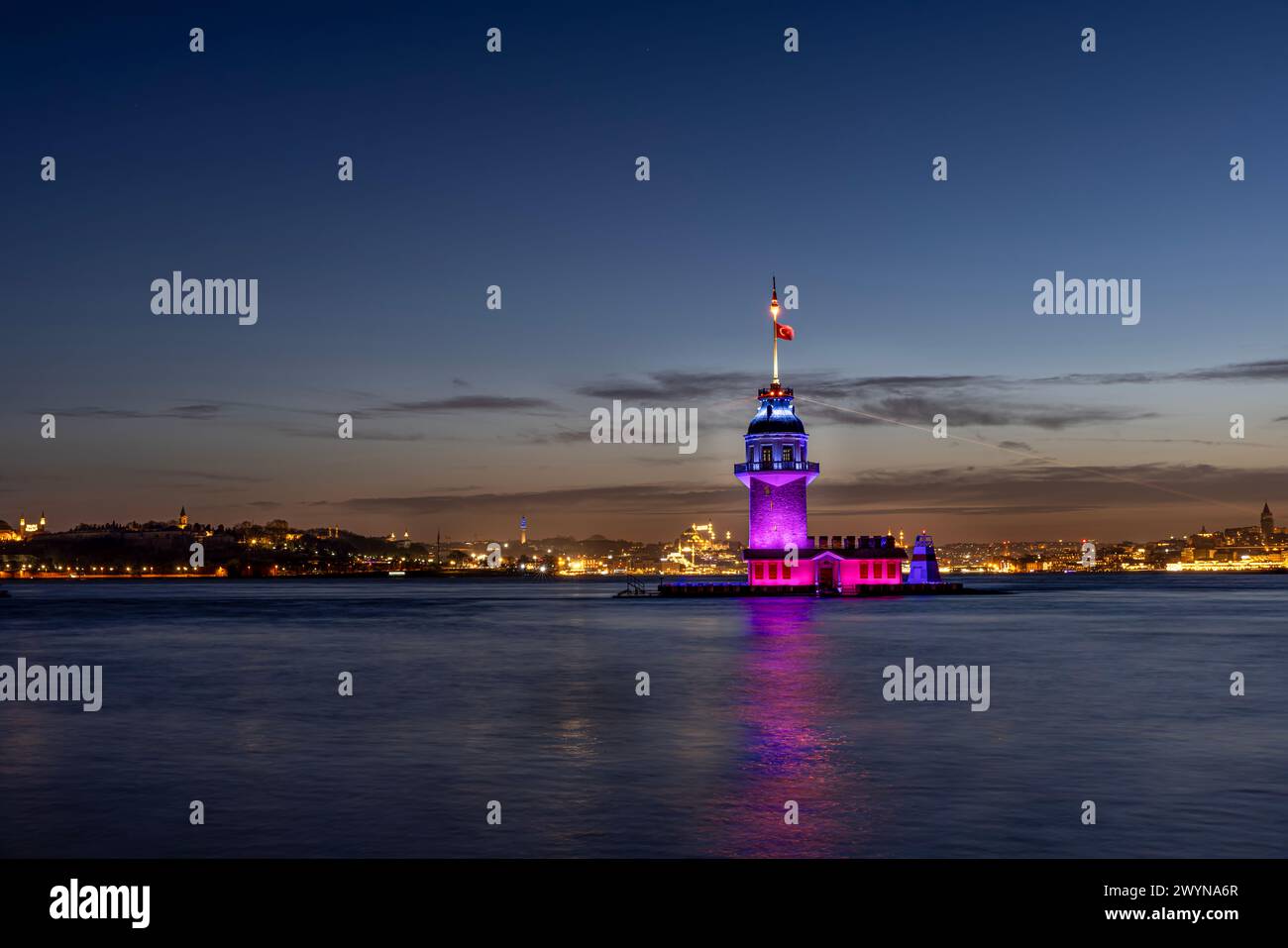 iery sunset over Bosphorus with famous Maiden's Tower (Kiz Kulesi) also ...