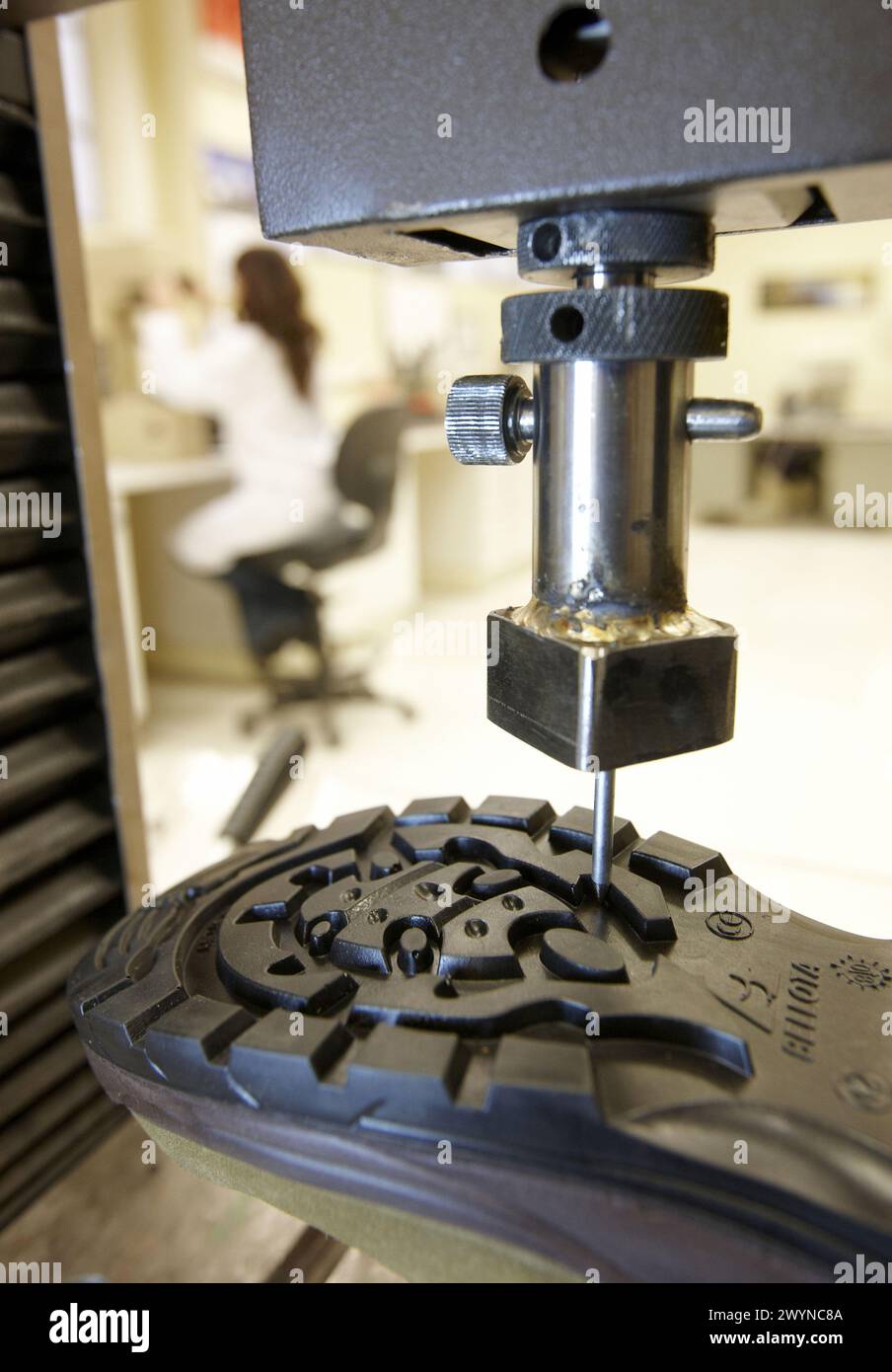 Quality control, laboratory test, endurance test of safety boot sole ...