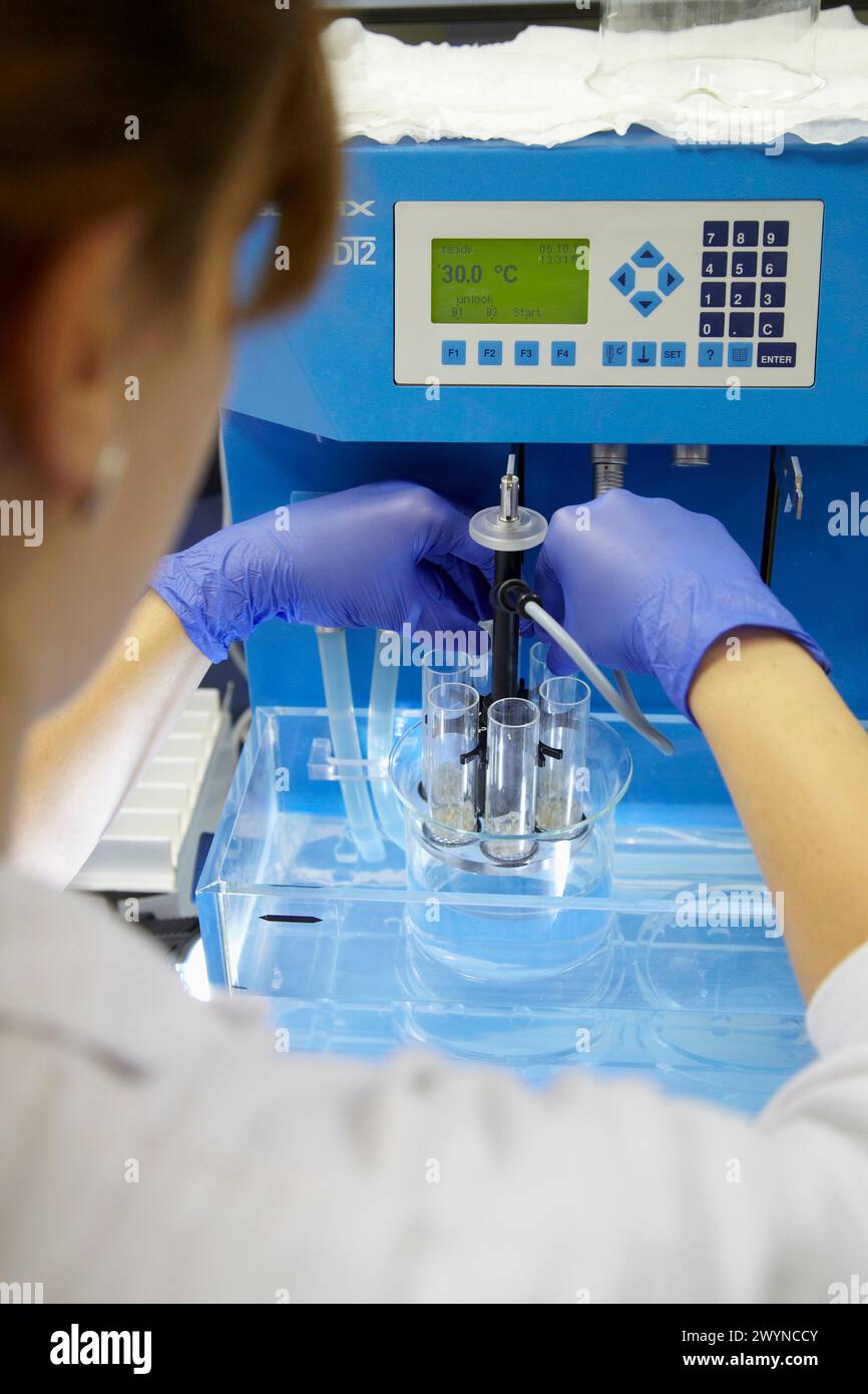 Pharmaceutical technician using control hi-res stock photography and ...