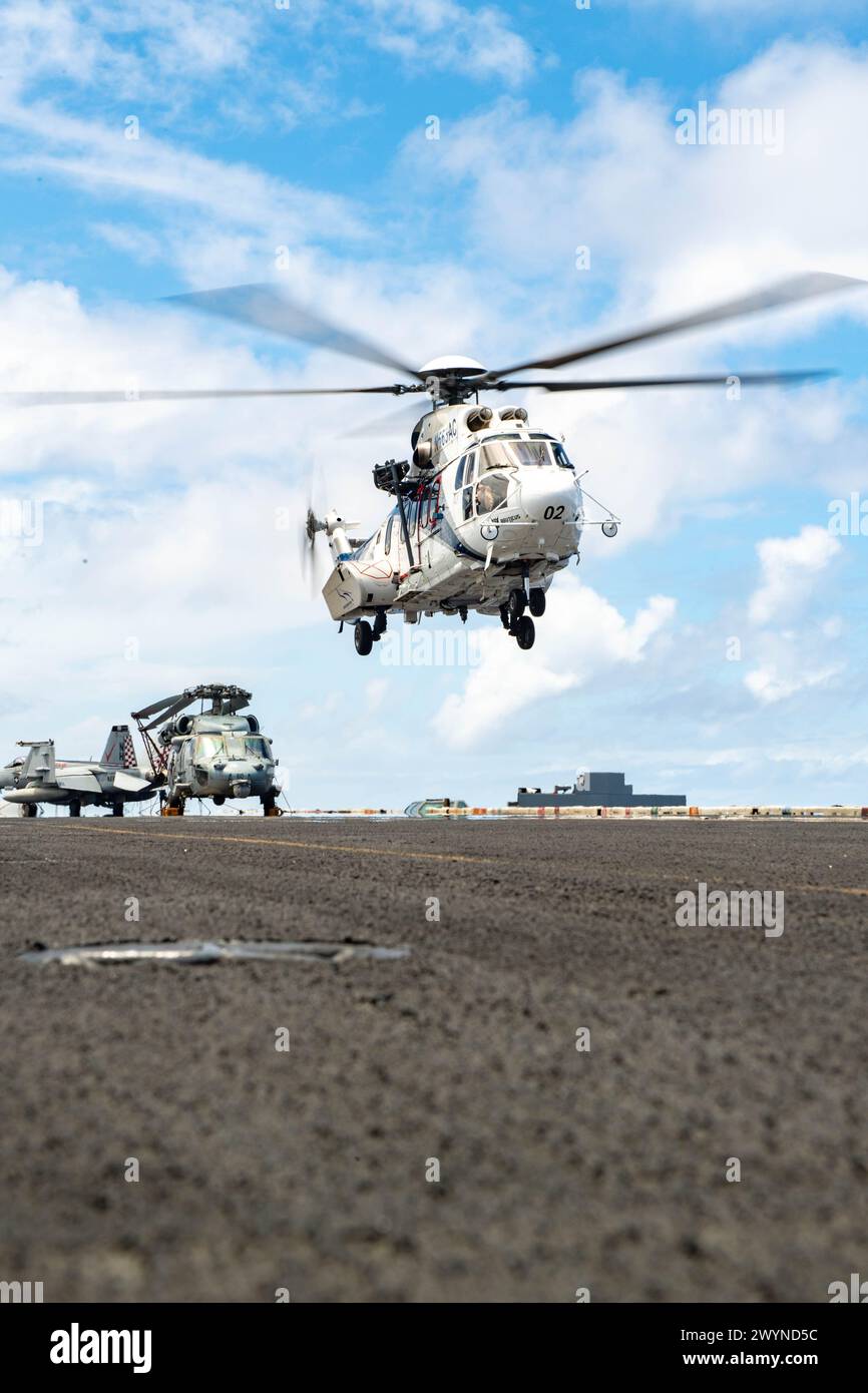 PHILIPPINE SEA (April 5, 2024) An AS-332 Super Puma, assigned to the ...