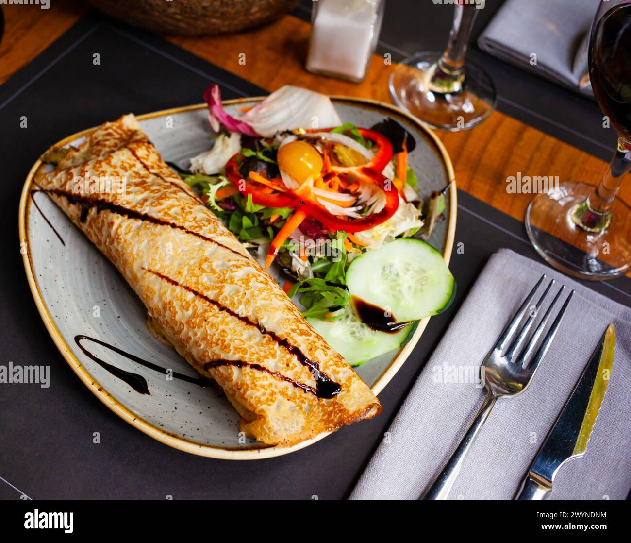 Crepes with vegetable salad and balsamic sauce Stock Photo - Alamy
