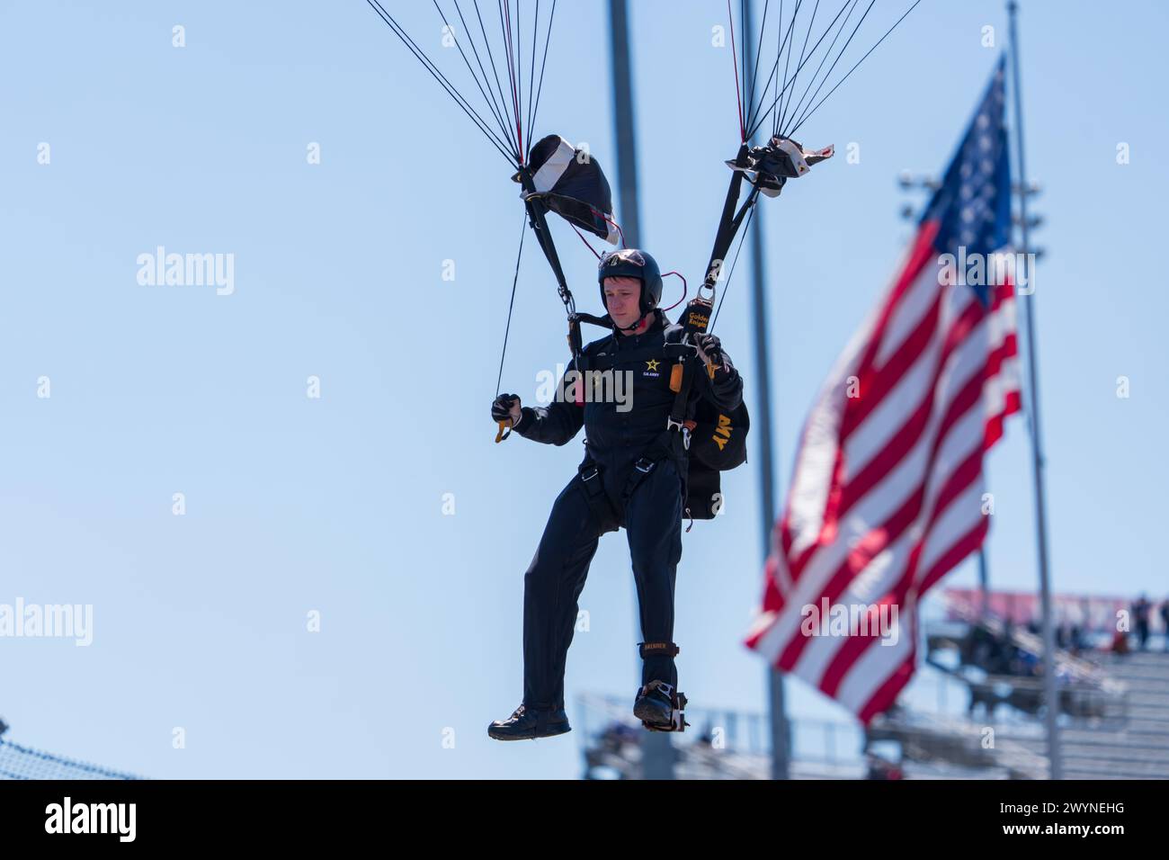 Staff Sgt. Justin Brenner of the U.S. Army Parachute Team lands his ...