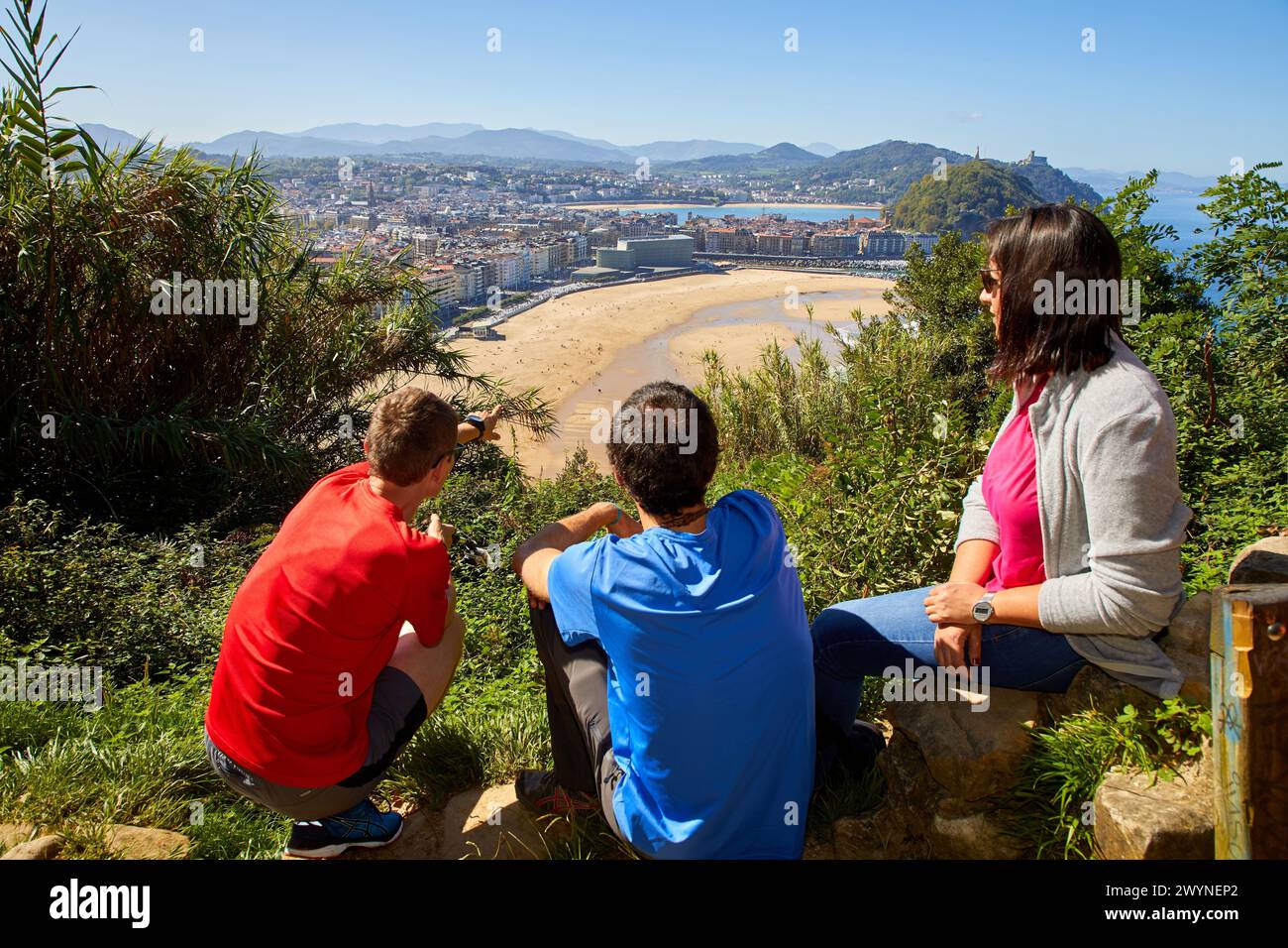 Group of tourists and guide making a tour, Mirador del Monte Ulia ...
