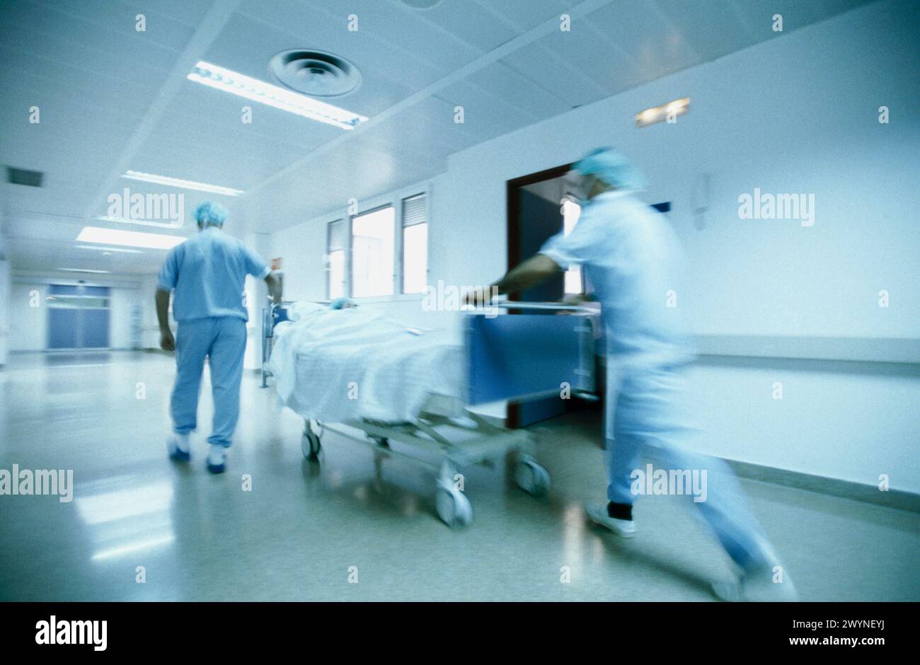 Nurses carrying stretcher Stock Photo - Alamy