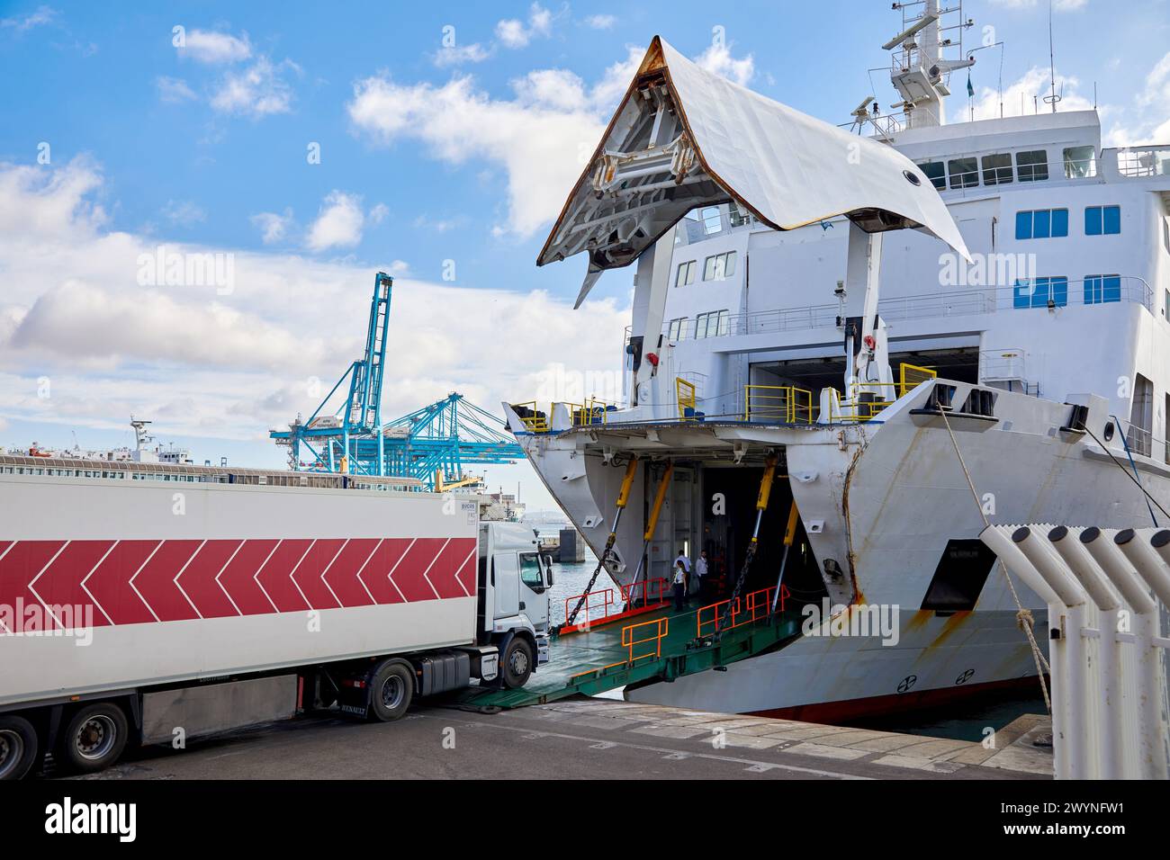 Loading trucks with a trailer, Ferry between Tangier Morocco and ...