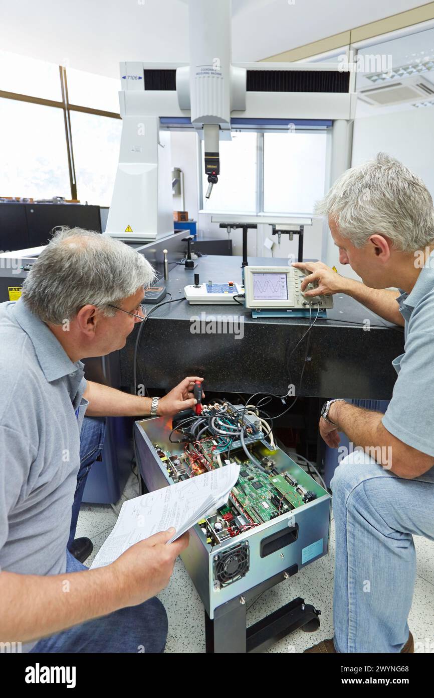 The SAT team calibrating three-dimensional machine. Calibration of CMM ...