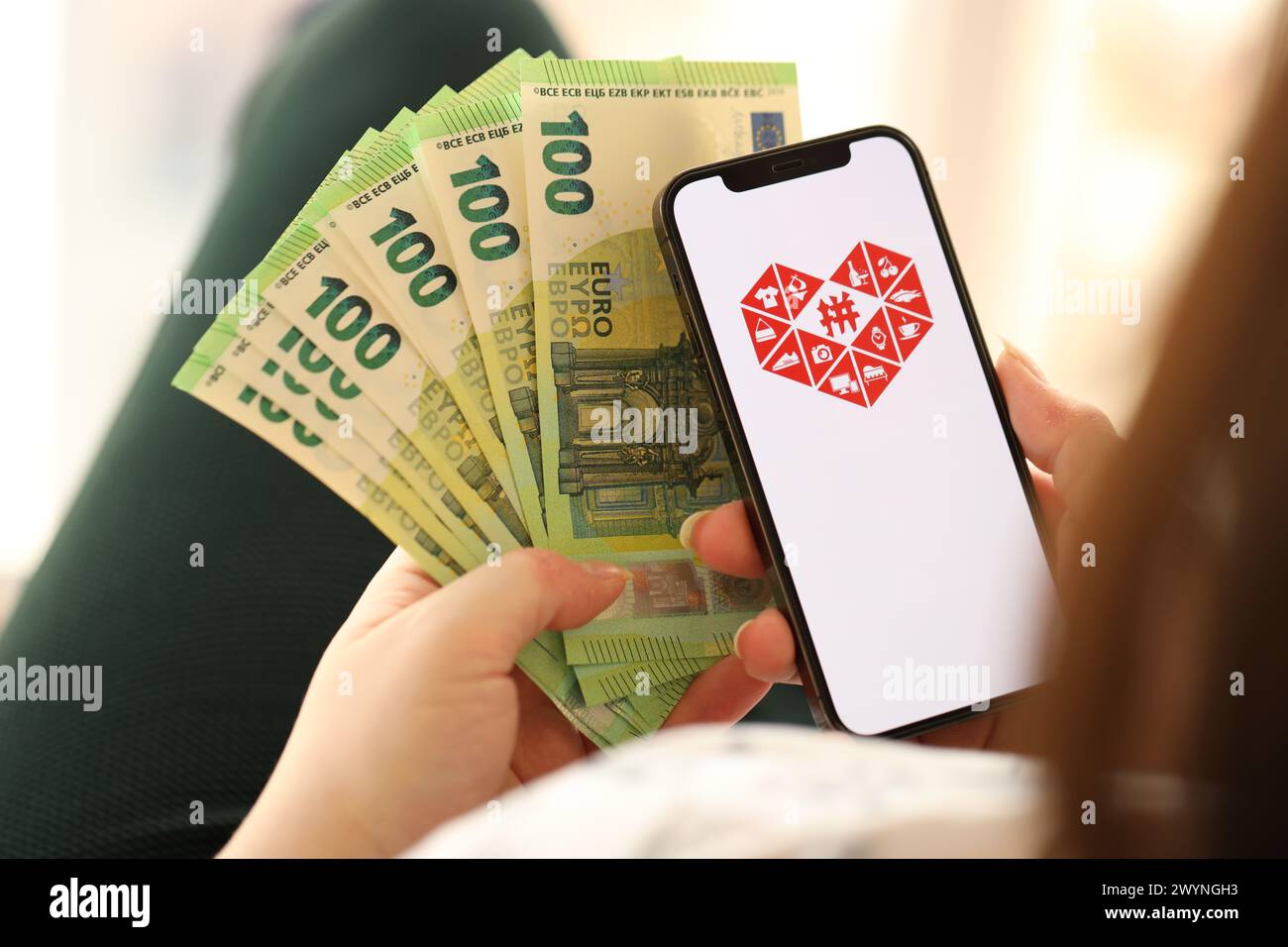 KYIV, UKRAINE - APRIL 1, 2024 Pinduoduo icon on smartphone screen and ...