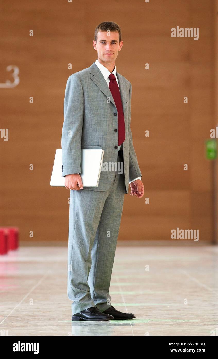 Man carrying laptop body hi-res stock photography and images - Alamy