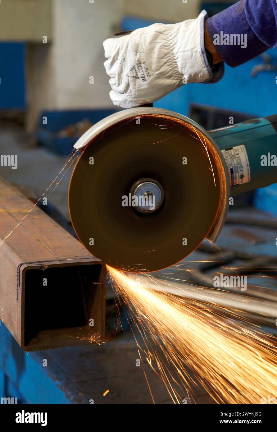 Cutting square hollow steel section, grinding machine with abrasive ...