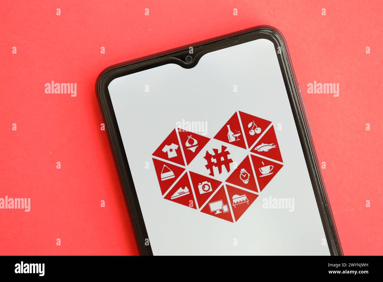 KYIV, UKRAINE - APRIL 1, 2024 Pinduoduo icon on smartphone screen on ...