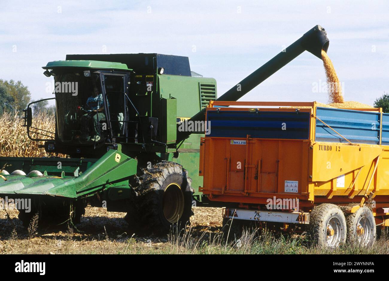 Corn, combine harvester Stock Photo - Alamy