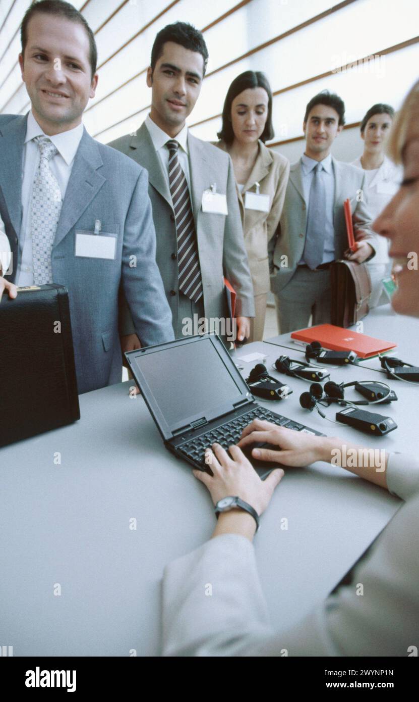 Business trade show, check-in Stock Photo - Alamy
