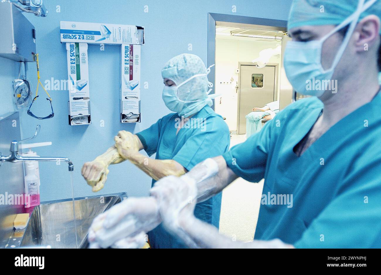 Surgeons washing hands at traumatology operating room of hospital Stock ...