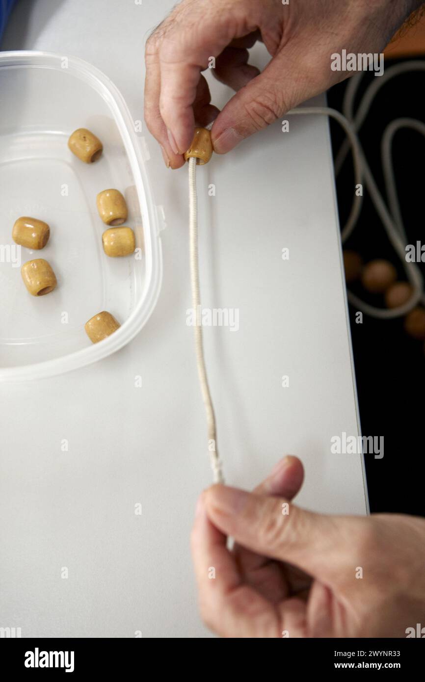 Occupational therapy beads string coordination hi-res stock photography ...