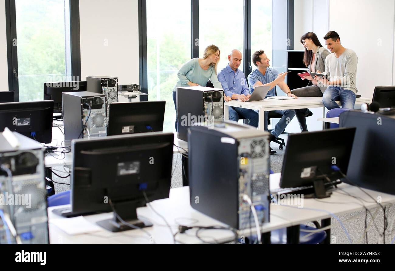 Group of teachers. Computer Academy Stock Photo - Alamy