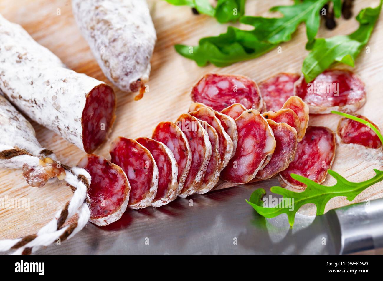 Traditional spanish thin salami sausage Fuet, sliced Stock Photo - Alamy